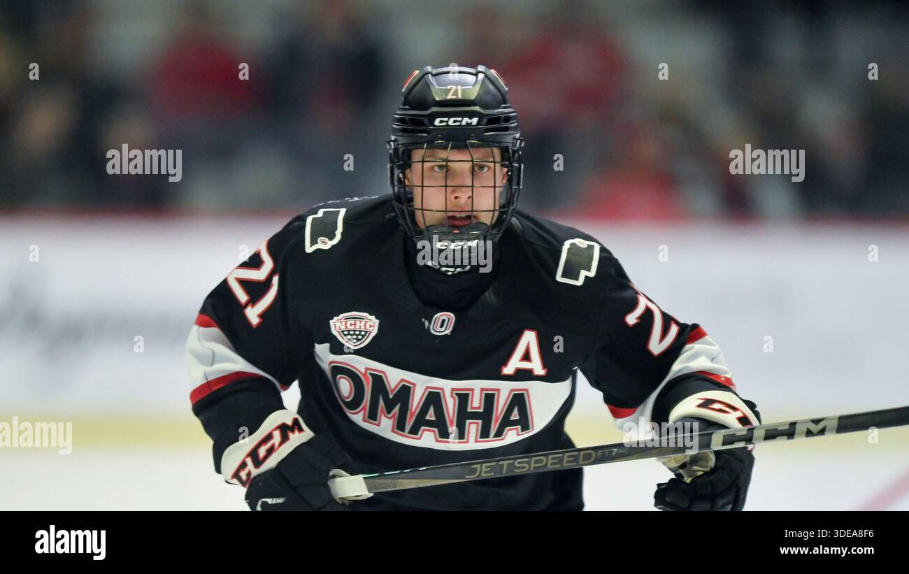 Omaha forward Tyler Rollwagen (21) skates during the first period of an ...