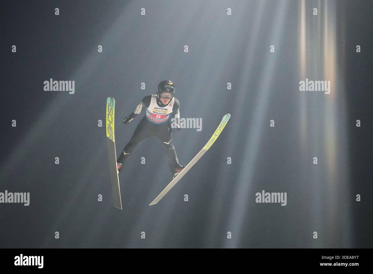 Ren Nikaido, of Japan, soars through the air during his first round ...