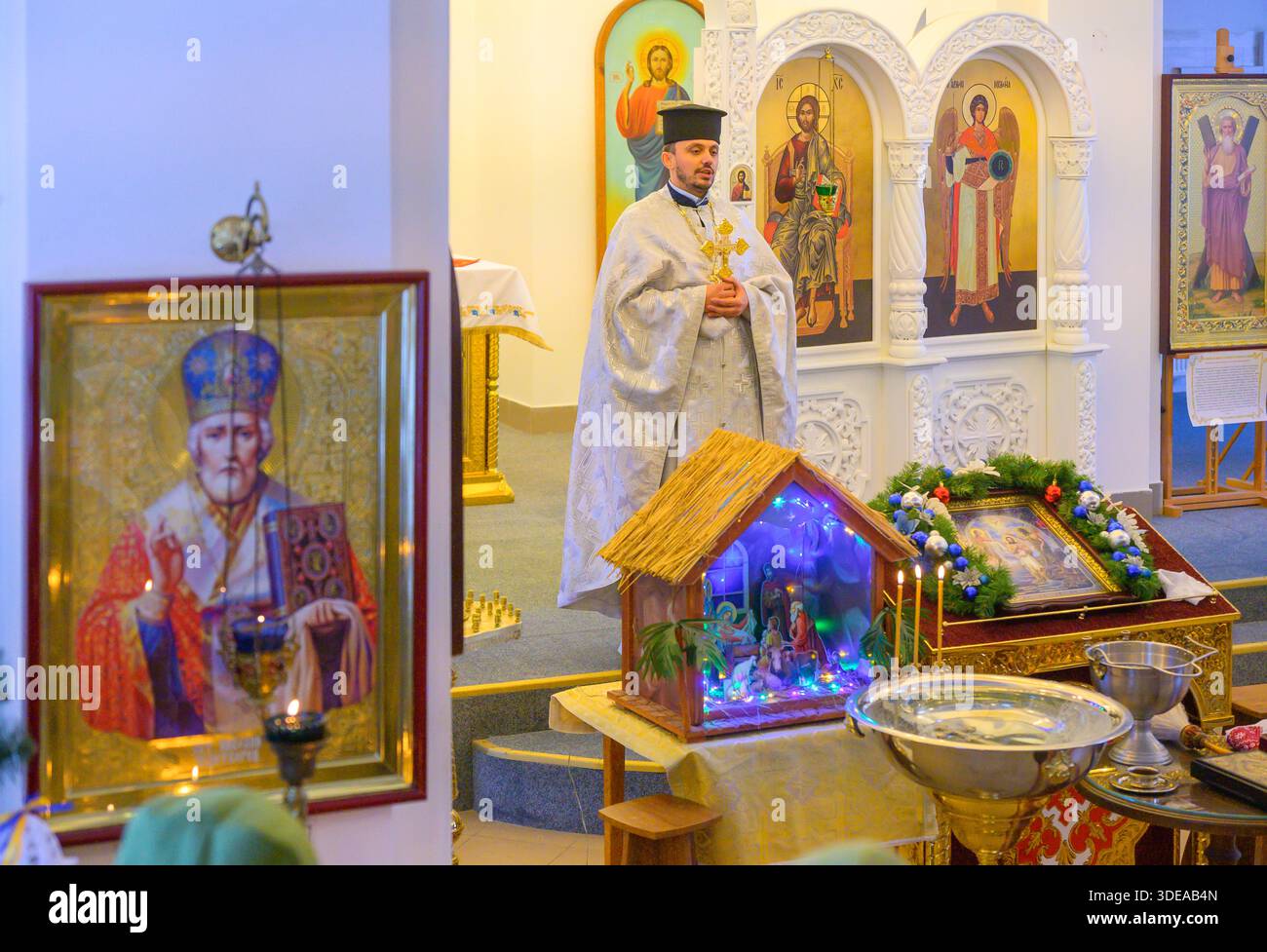 Kyiv, Ukraine 6th January,2026, Orthodox priest holding a cross ...