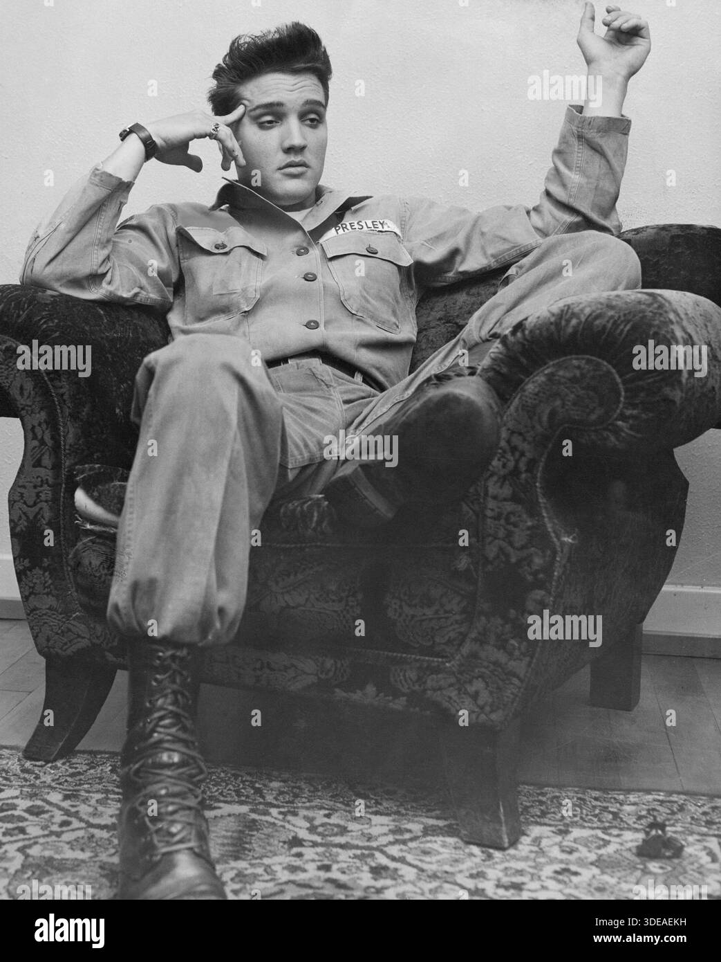 Singer Elvis Presley, dressed in green fatigues of the 3rd US Armored ...