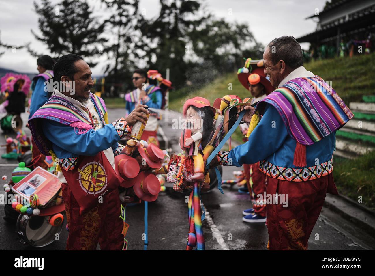 Revelers get their costumes and props ready for the start of the Black ...