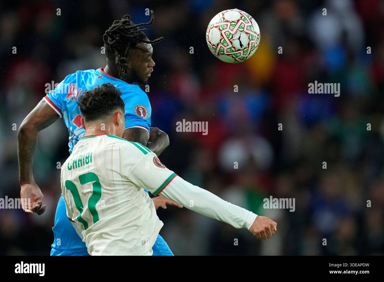 DR Congo's Aaron Wan-Bissaka, background, and Algeria's Fares Chaibi ...