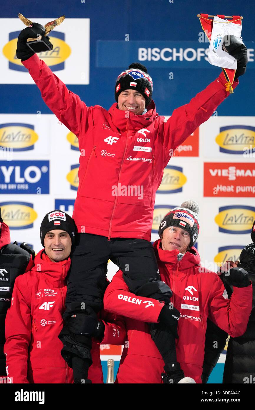 Kamil Stoch, of Poland, who is retiring, celebrates after receiving an ...