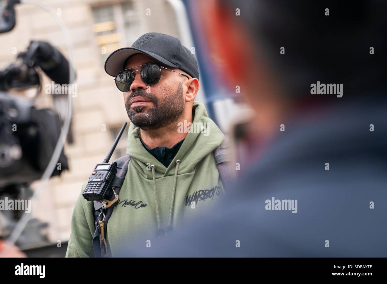 Enrique Tarrio, the former head of the Proud Boys, gets ready to march ...