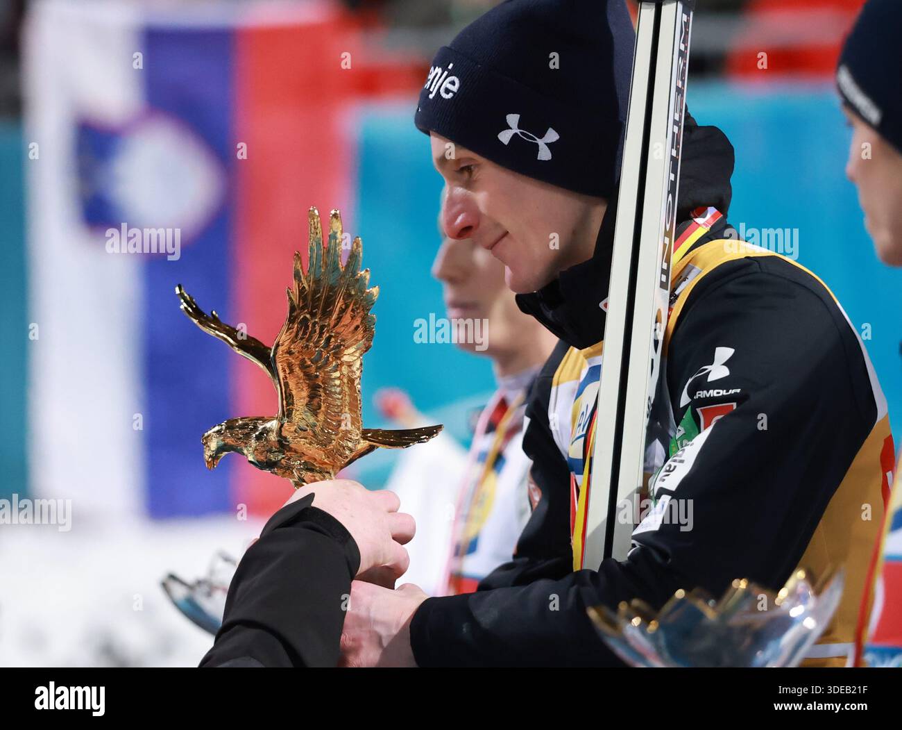 PREVC Domen of Slovenia claims the Golden Eagle Trophy during an award ...