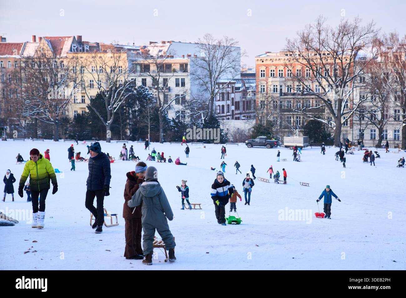 People enjoy snowfall in Berlin as winter weather covers the city ...