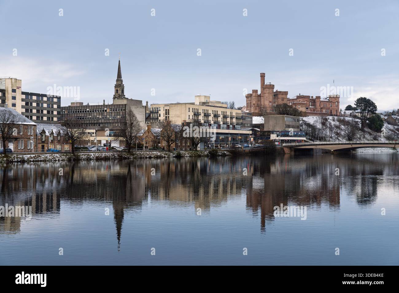 Snow covers the ground in Inverness City Centre. The River Ness ...