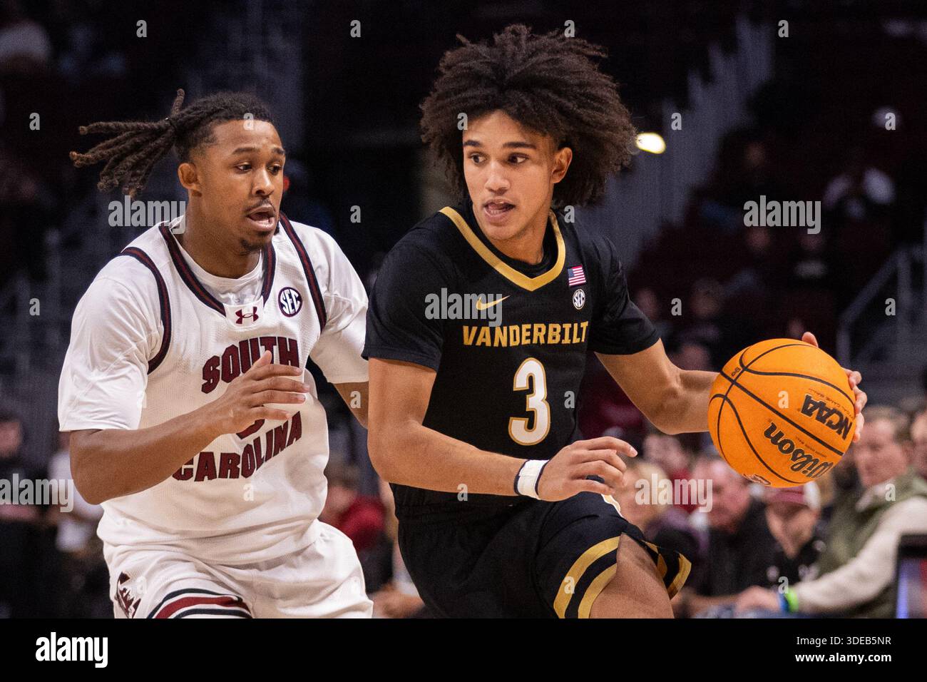Vanderbilt guard Tyler Tanner (3) drives past South Carolina forward ...