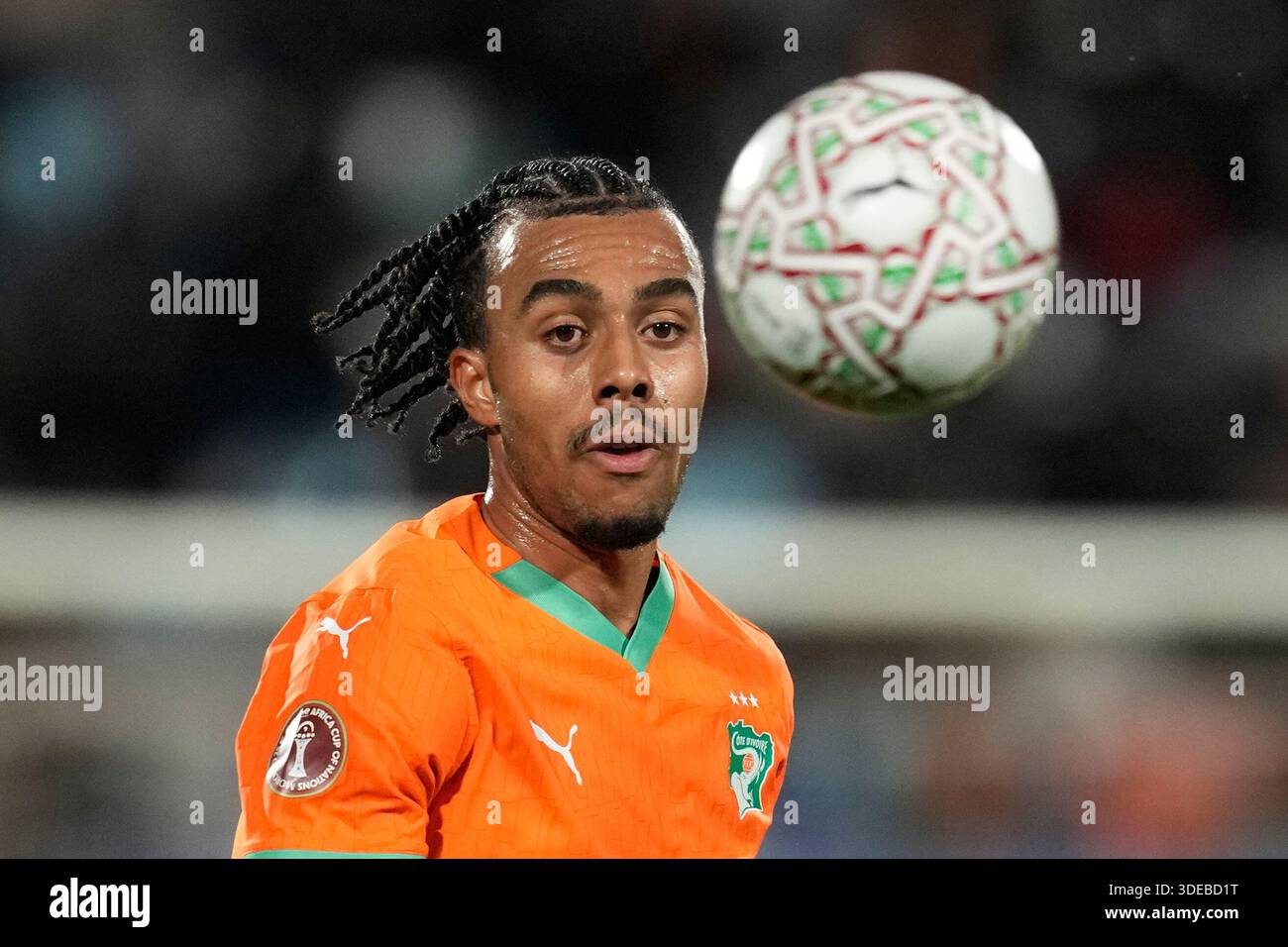 Ivory Coast's Guela Doue eyes the ball during the Africa Cup of Nations ...