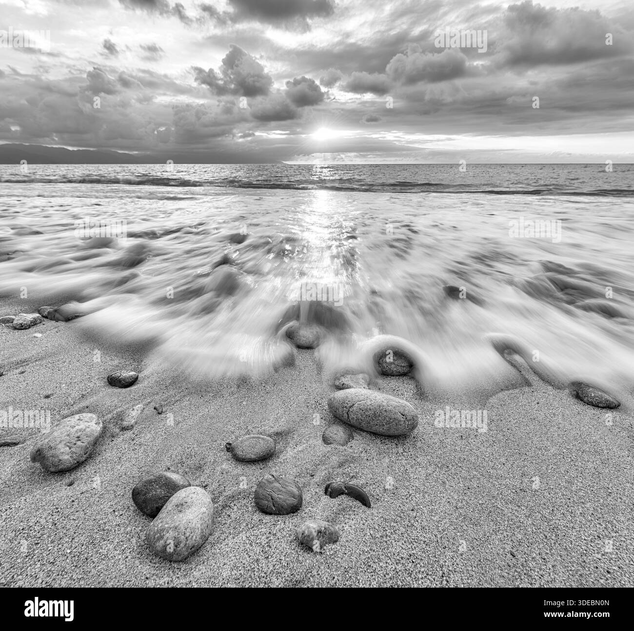 Ocean sunrise dramatic sky clouds Black and White Stock Photos & Images ...