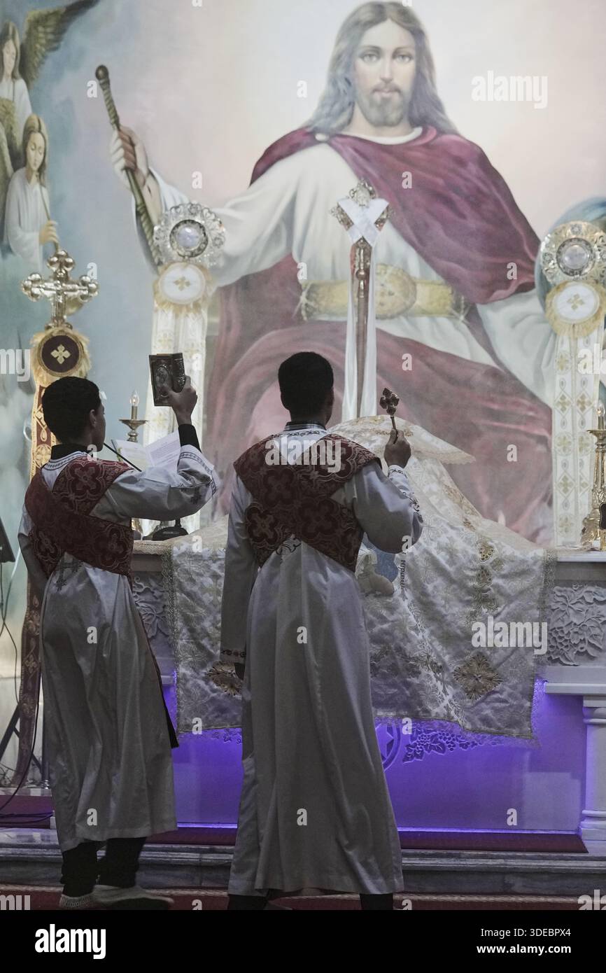 Coptic Orthodox worshippers attend Christmas prayers at Archangel ...