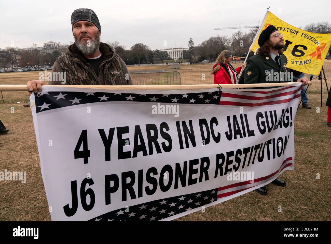 Demonstrators march at the Ellipse during Jan. 6 Anniversary Tuesday ...