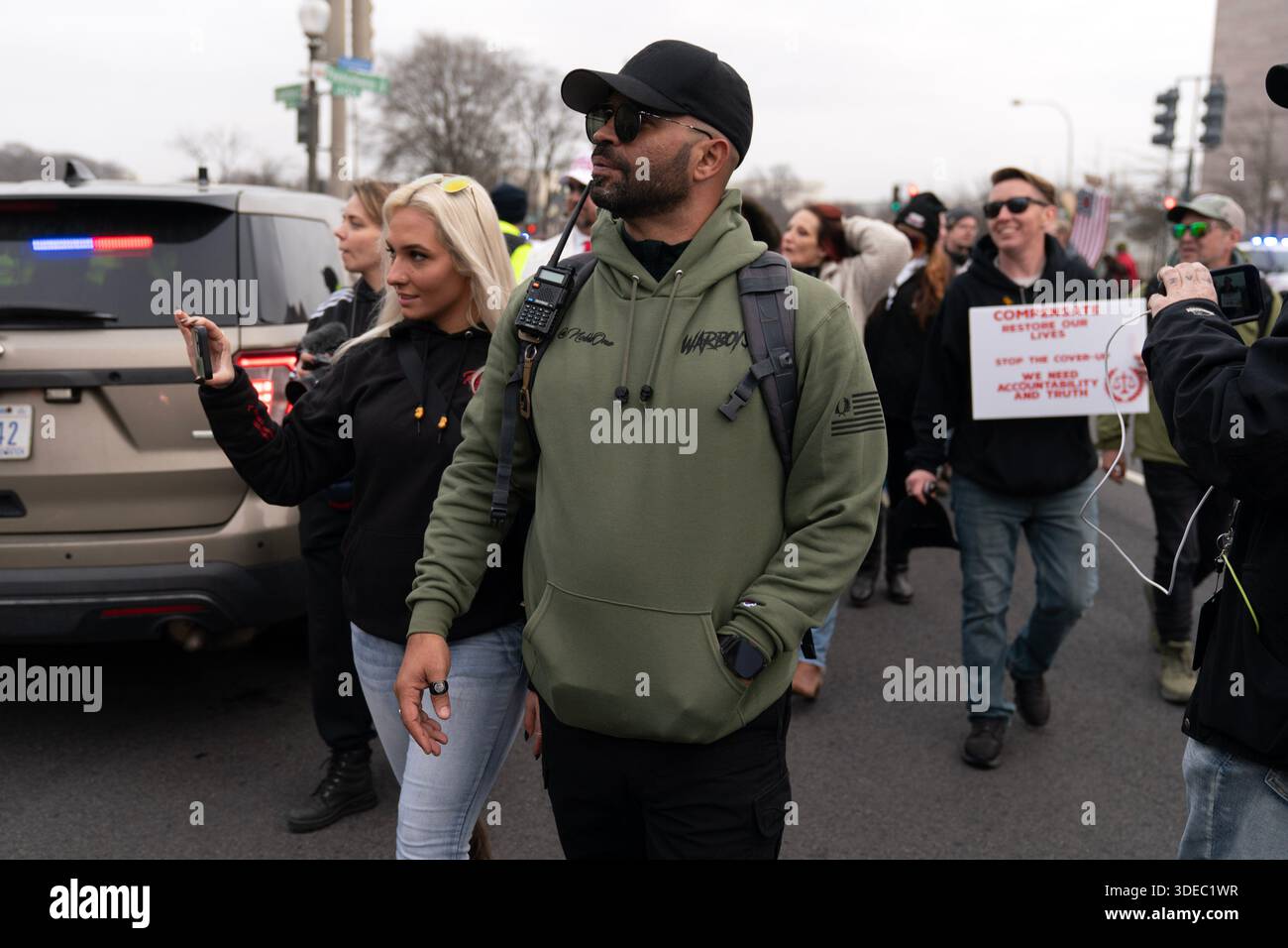 Enrique Tarrio, center, the former head of the Proud Boys, attends a ...