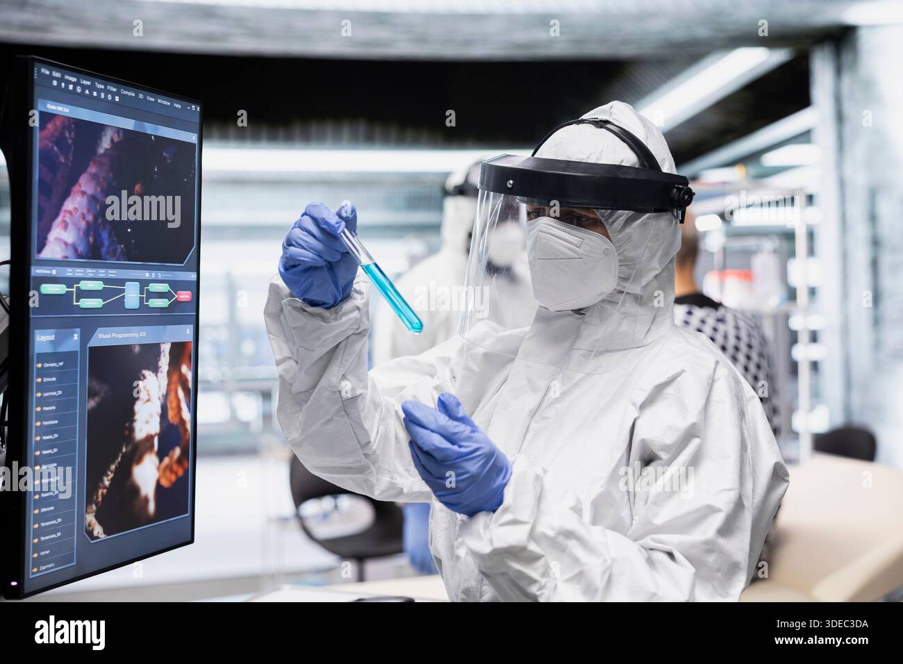Researcher in biocontainment lab conduct experiments on viral pathogens ...