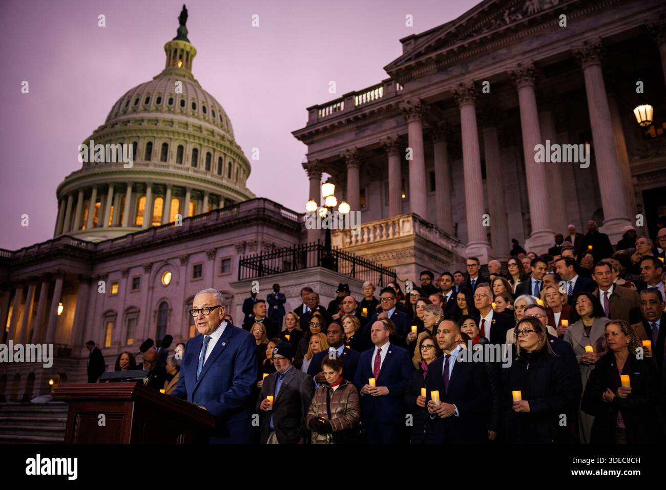 Senate Minority Leader Chuck Schumer (D-NY) speaks during a candlelight ...