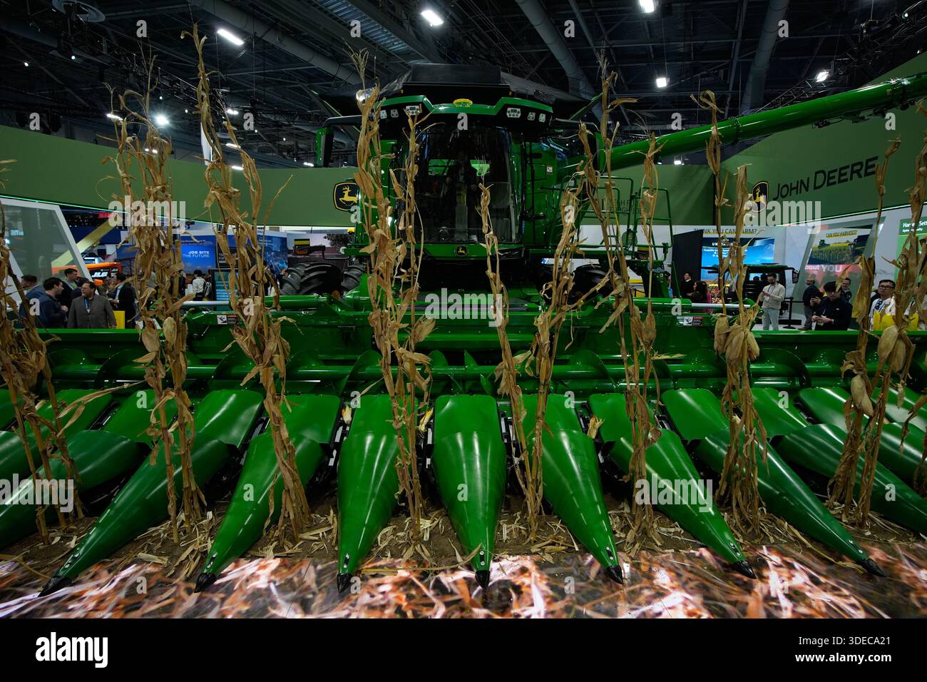 An X9 1100 combine sits on display at the John Deere booth during the ...