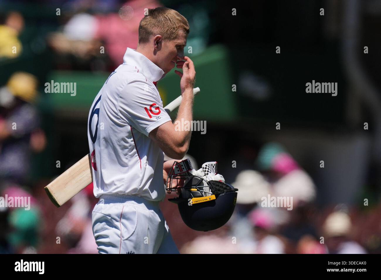 England's Zak Crawley walks from the field after he was dismissed during play on day four of the ...