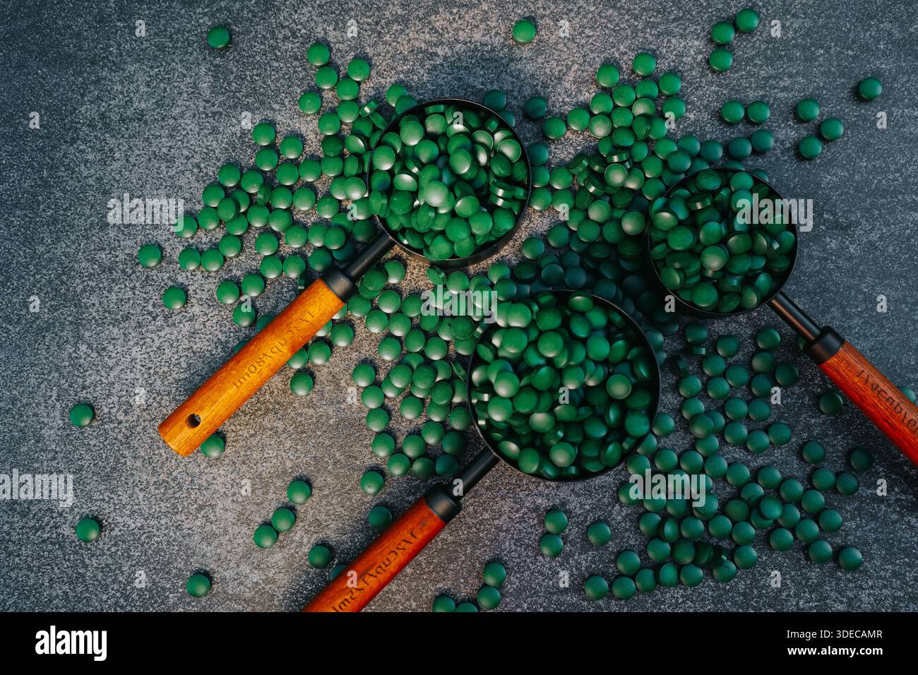 Measuring spoons spirulina tablets super hi-res stock photography and ...