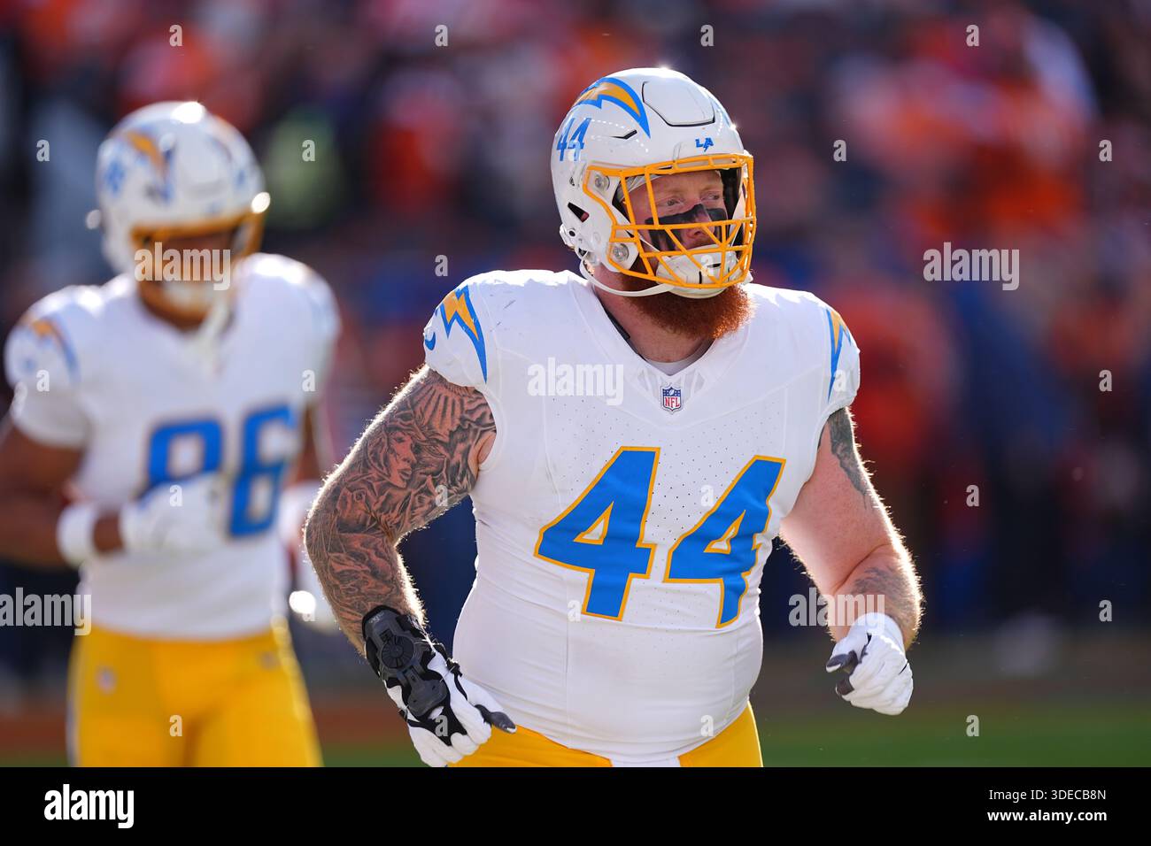 Los Angeles Chargers defensive tackle Scott Matlock (44) warms up ...