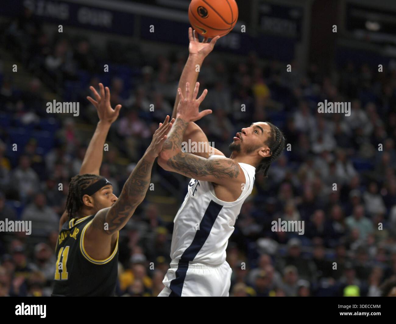 Penn State's Freddie Dilione V, right, shoots on Michigan's Roddy Gayle ...