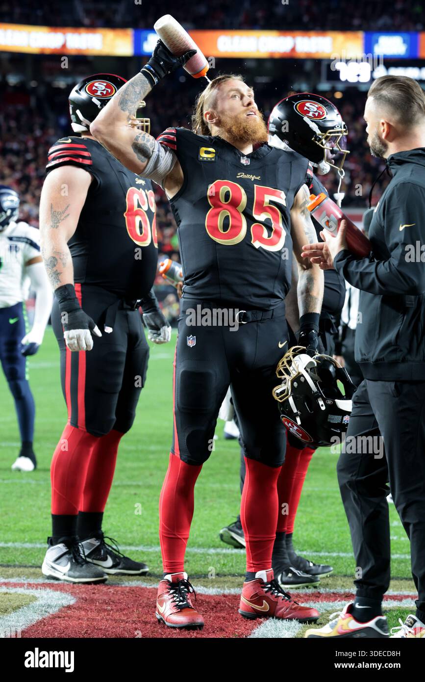 San Francisco 49ers tight end George Kittle (85) squeezes a Gatorade ...