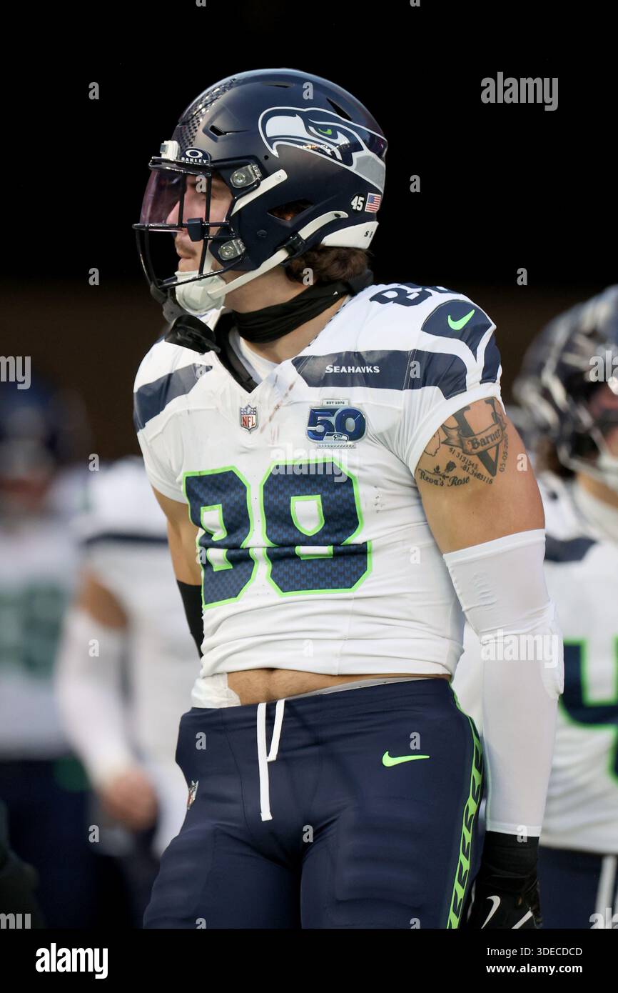 Seattle Seahawks tight end AJ Barner (88) runs onto the field during an ...