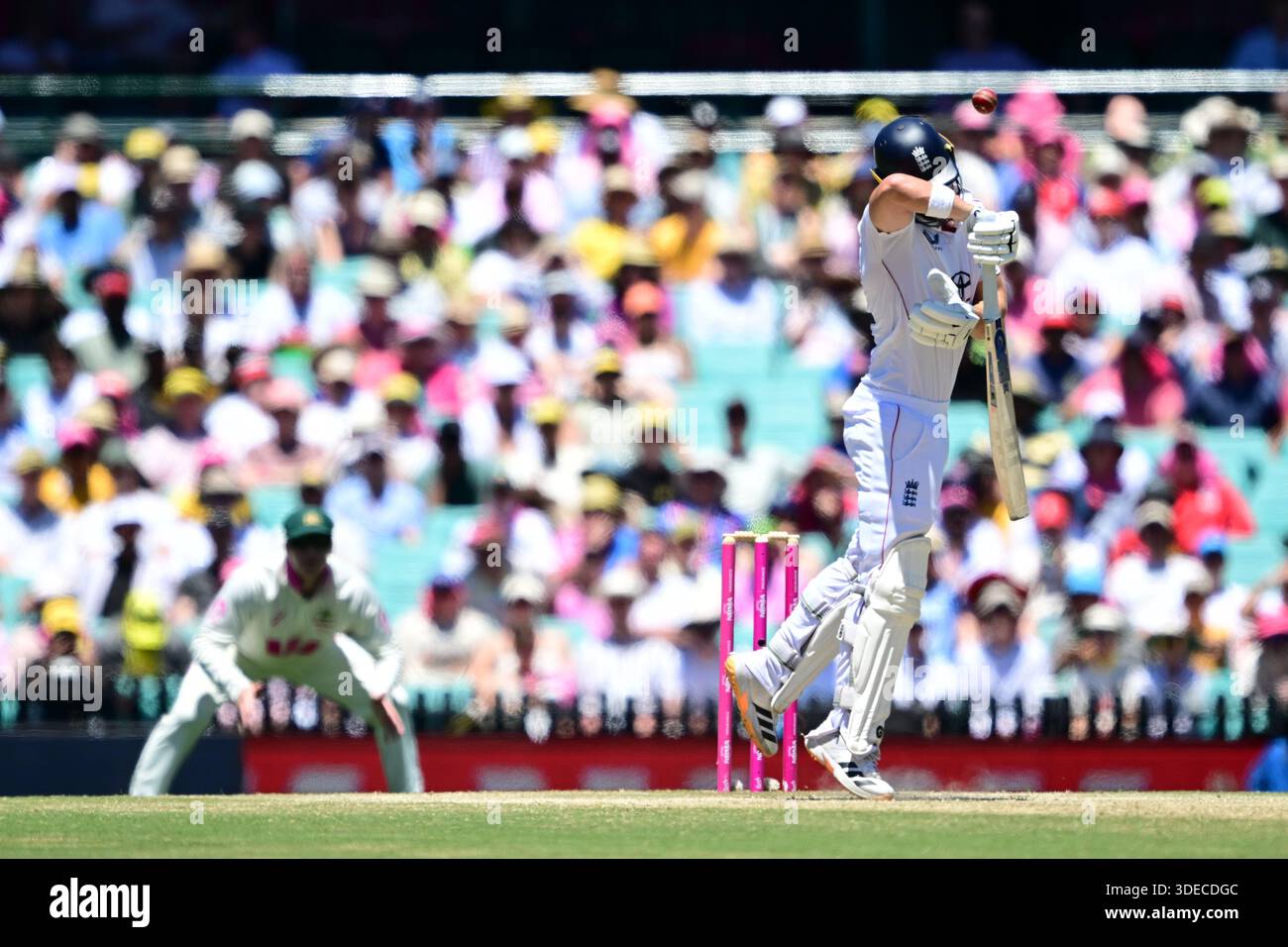Jacob Bethell of England is hit by a bouncer from Cameron Green of ...