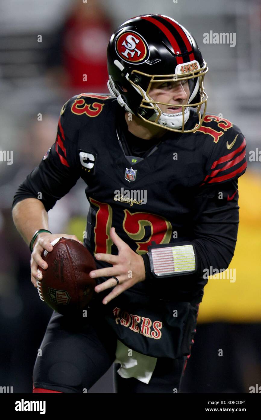 San Francisco 49ers quarterback Brock Purdy (13) runs during an NFL ...