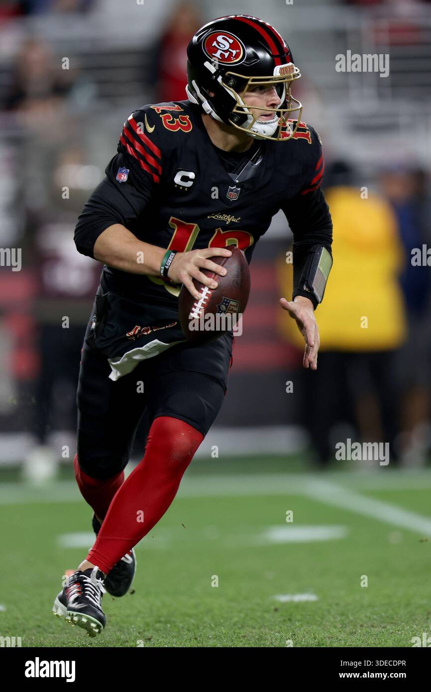 San Francisco 49ers quarterback Brock Purdy (13) runs during an NFL ...