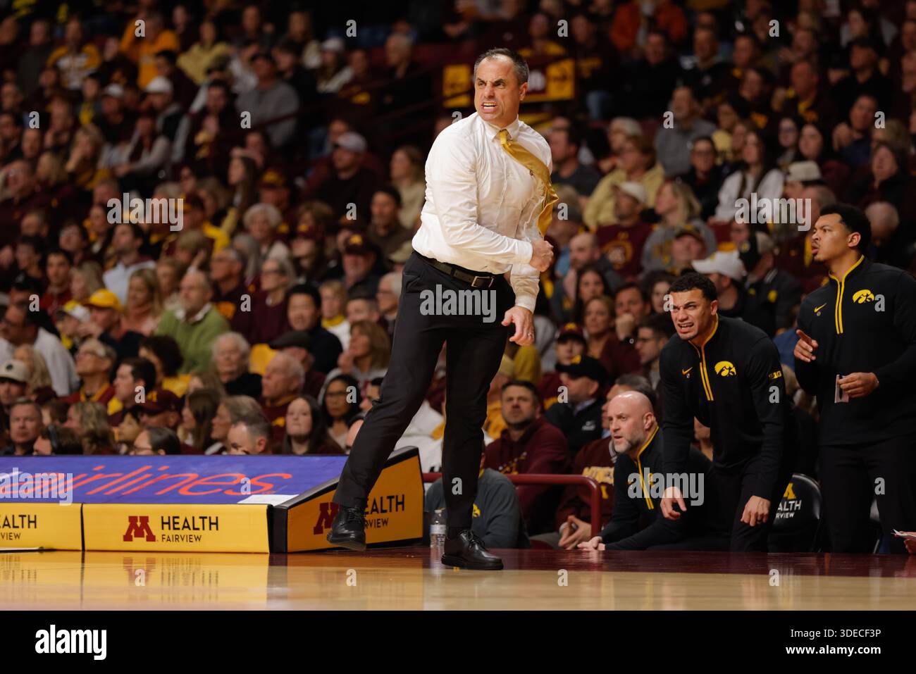 Iowa Hawkeyes head coach Ben McCollum reacts during the first half of ...