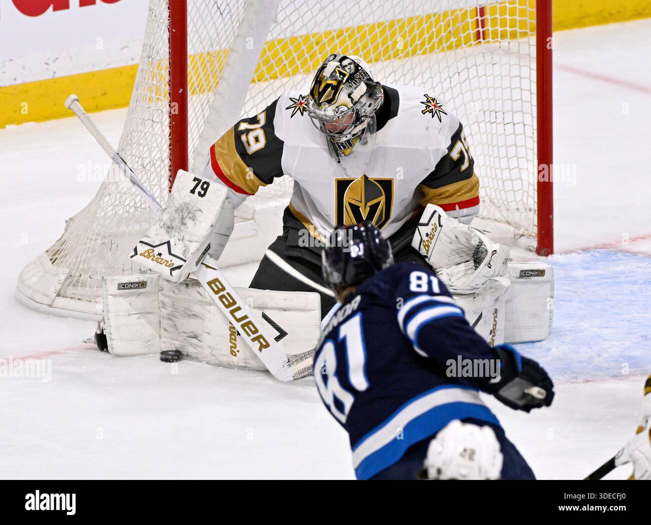 Vegas Golden Knights goaltender Carter Hart makes a save on Winnipeg ...