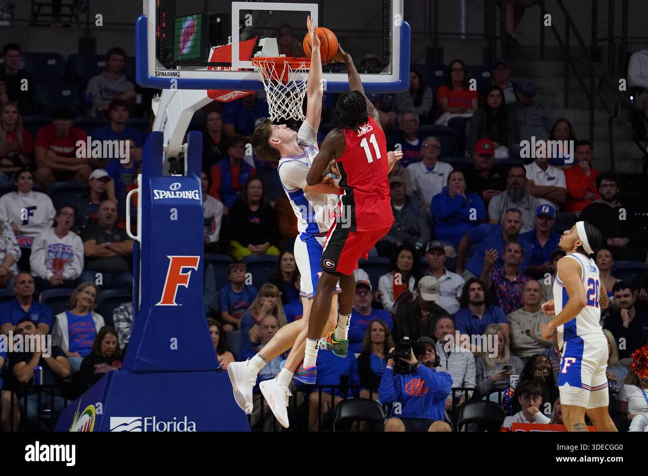 Georgia forward Dylan James is blocked from completing a layup by ...
