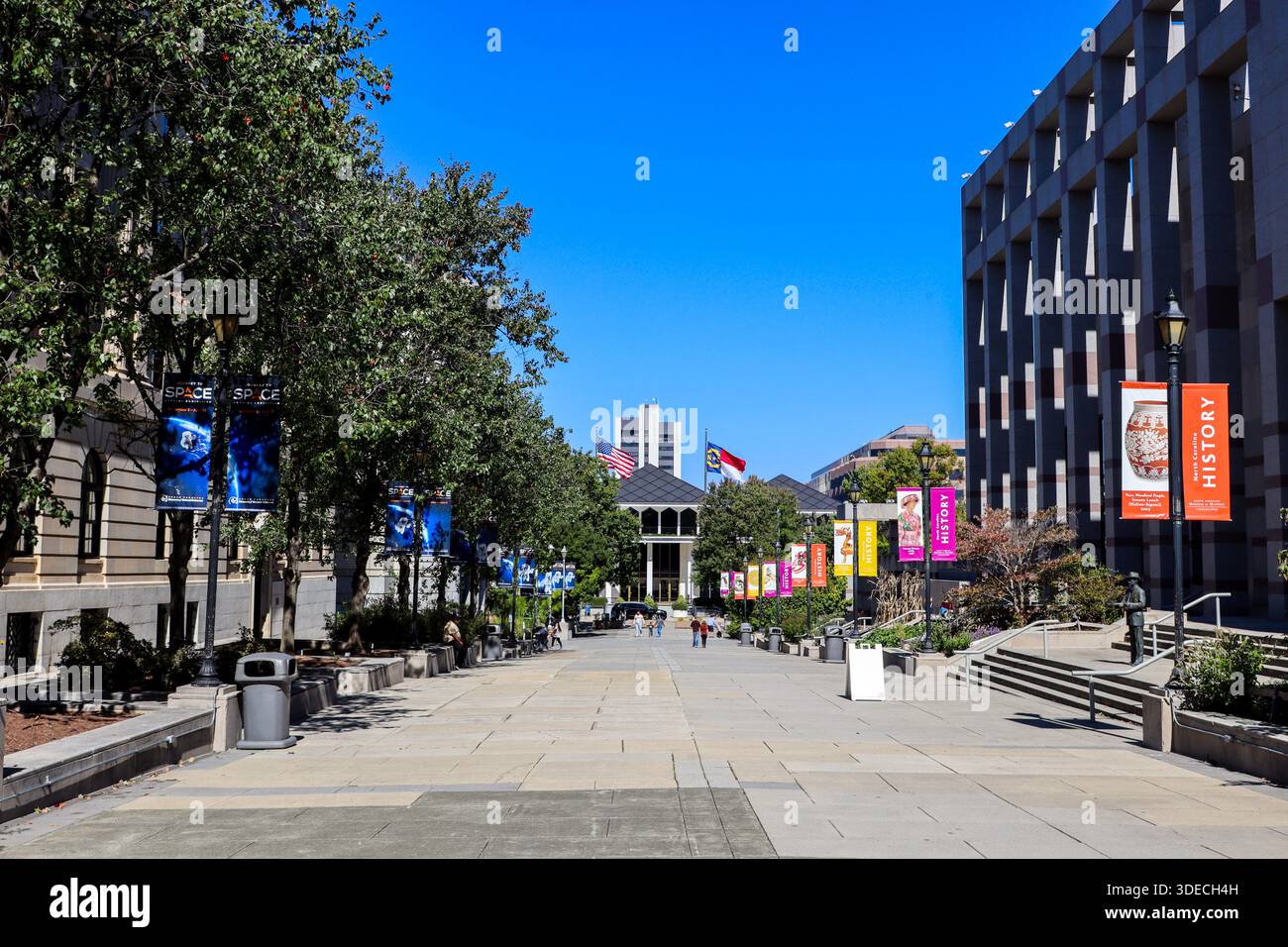 Open pedestrian plaza surrounded by cultural buildings and colorful ...