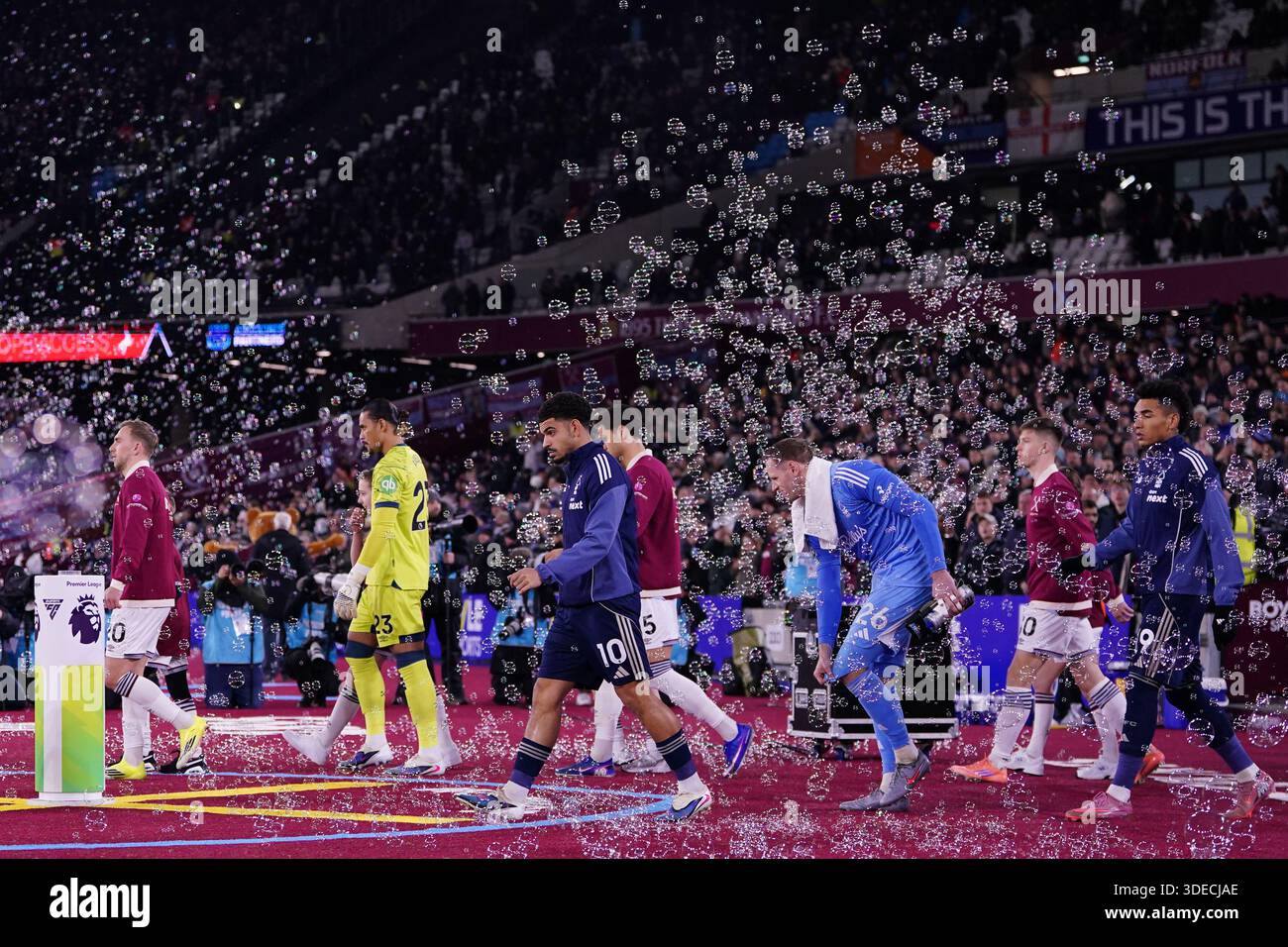Both sets of players walk out ahead of the Premier League match West ...