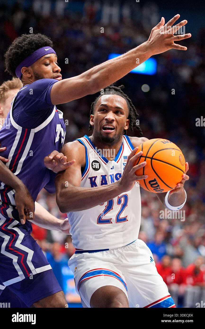 Kansas guard Darryn Peterson (22) looks to shoot under pressure from ...