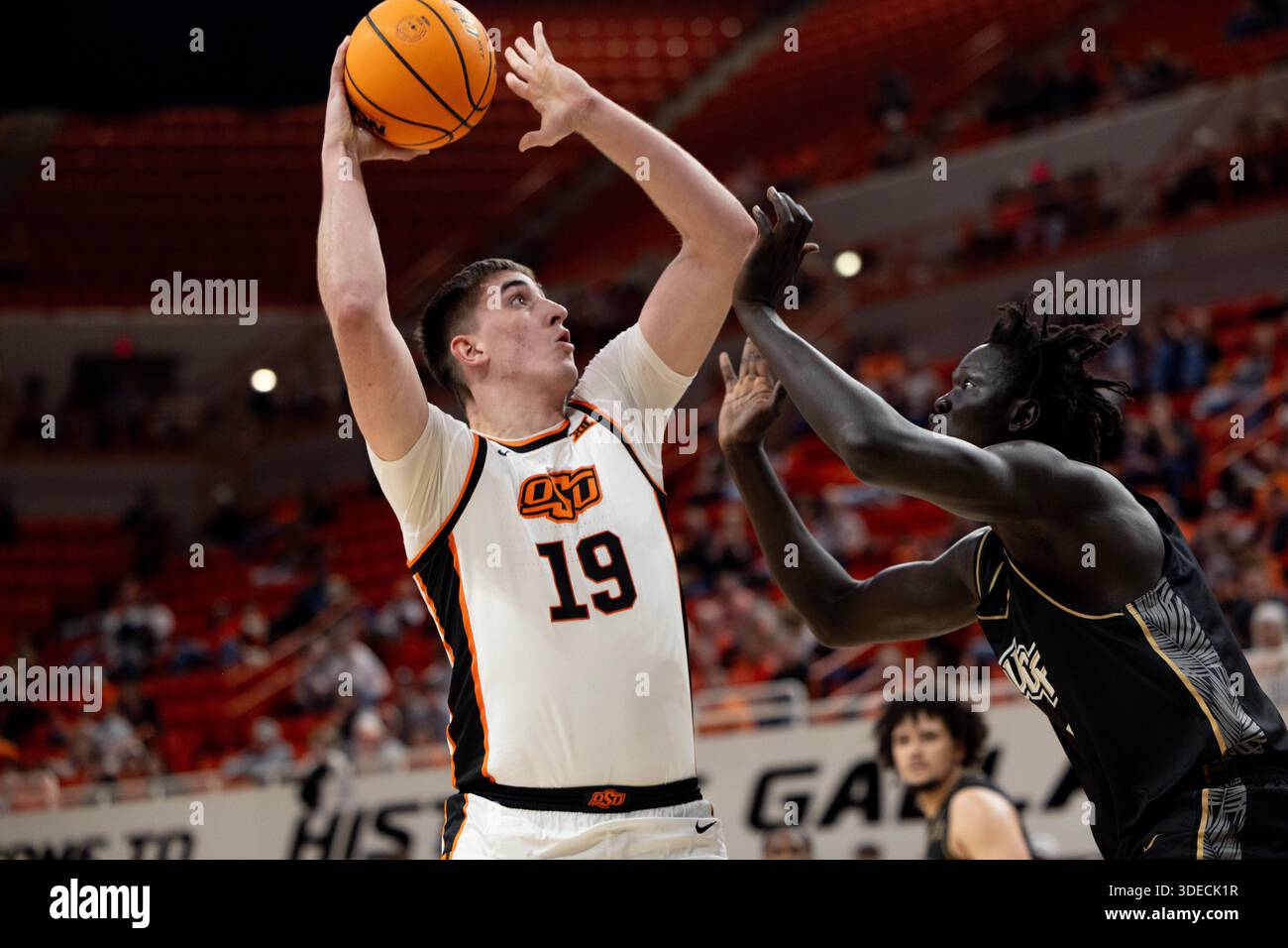 Oklahoma State forward Andrija Vukovic (19) shoots over Central Florida ...