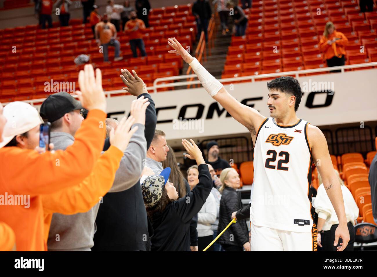 Oklahoma State center Parsa Fallah (22) celebrates with fans after the ...