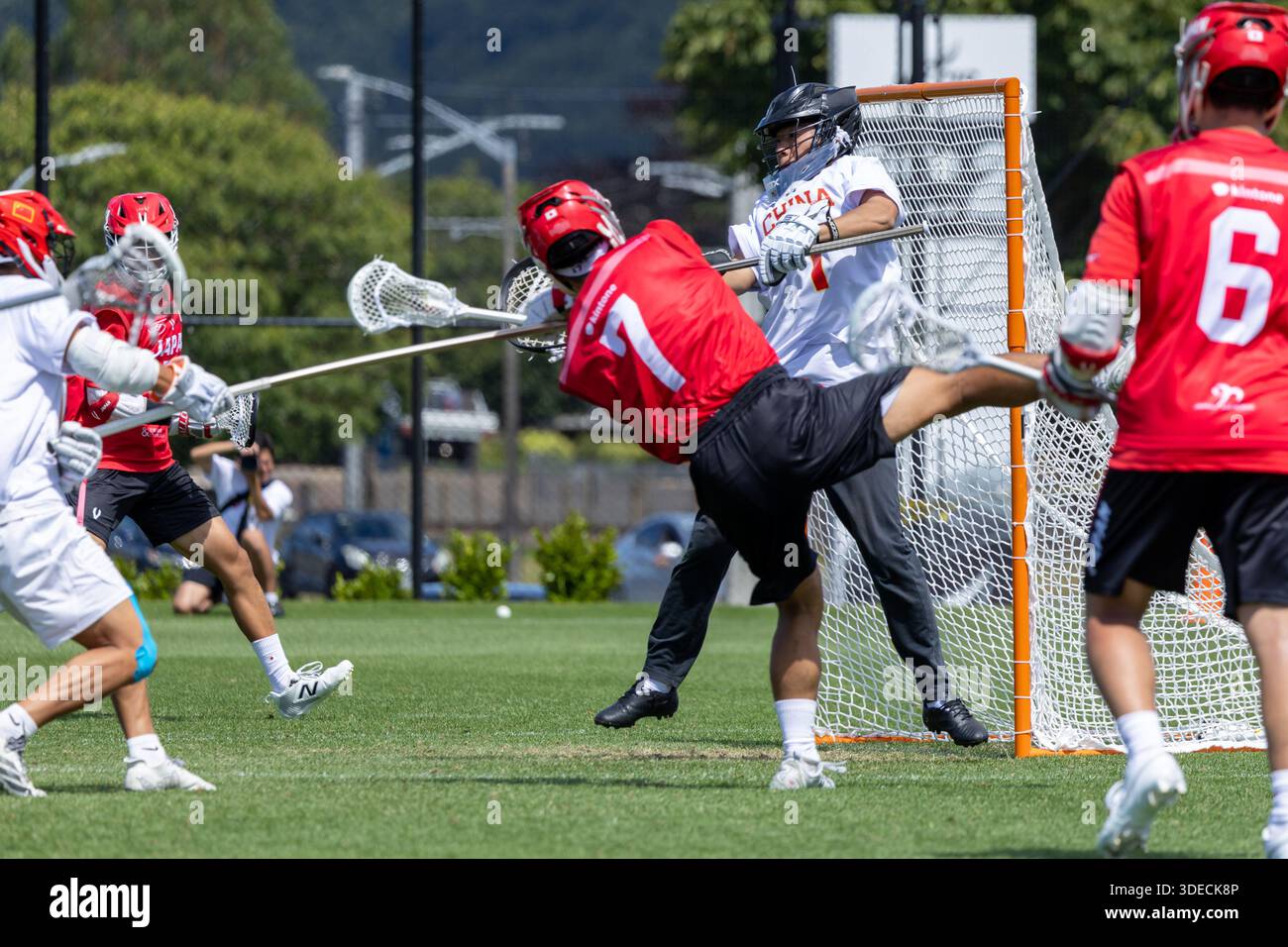 Goalkeeper Bangding Wang (1, China) bravely stands up to a close range ...