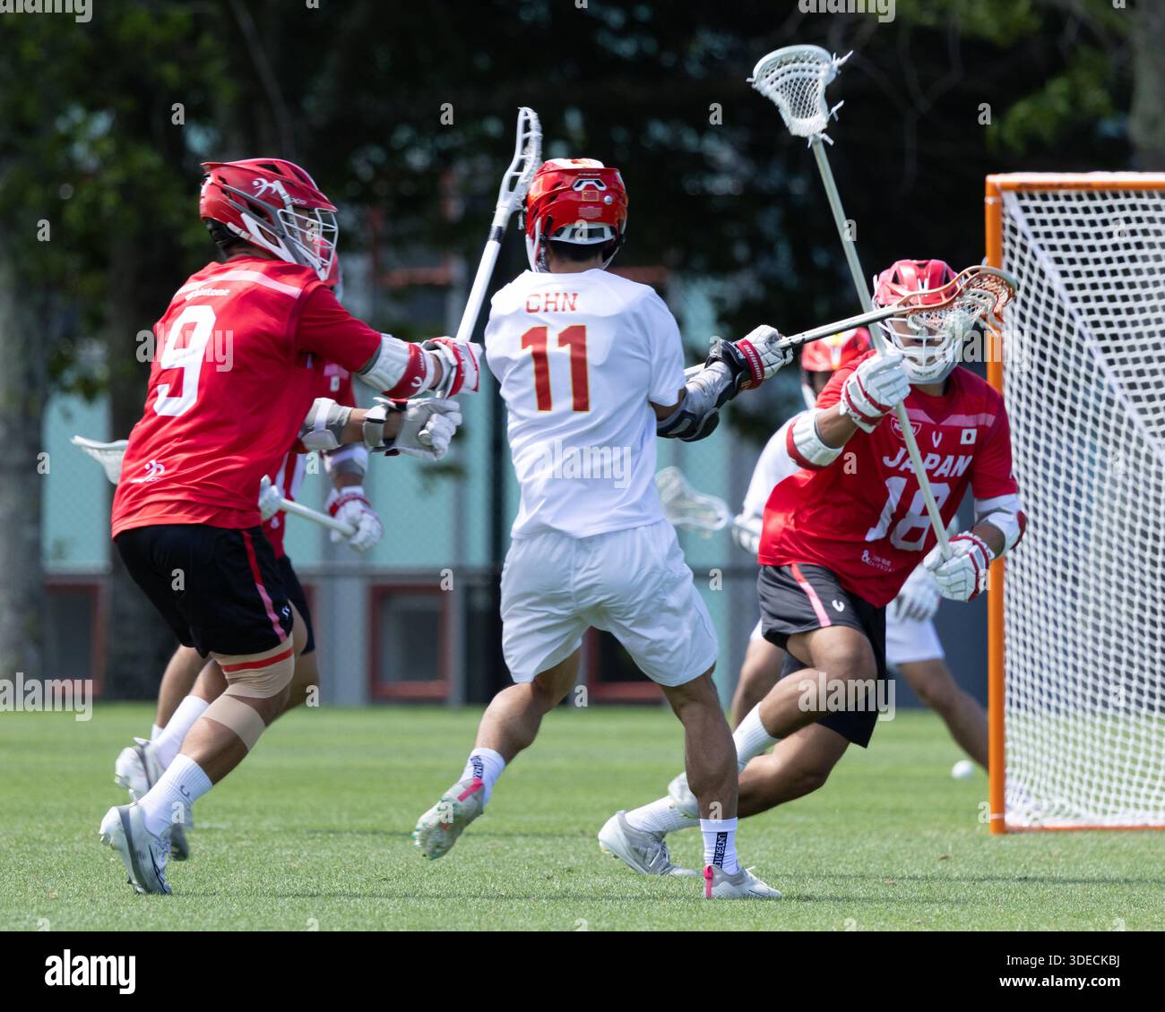 Haonan Chen (11, China) shoots despite close pressure from Eda Ryosuke ...