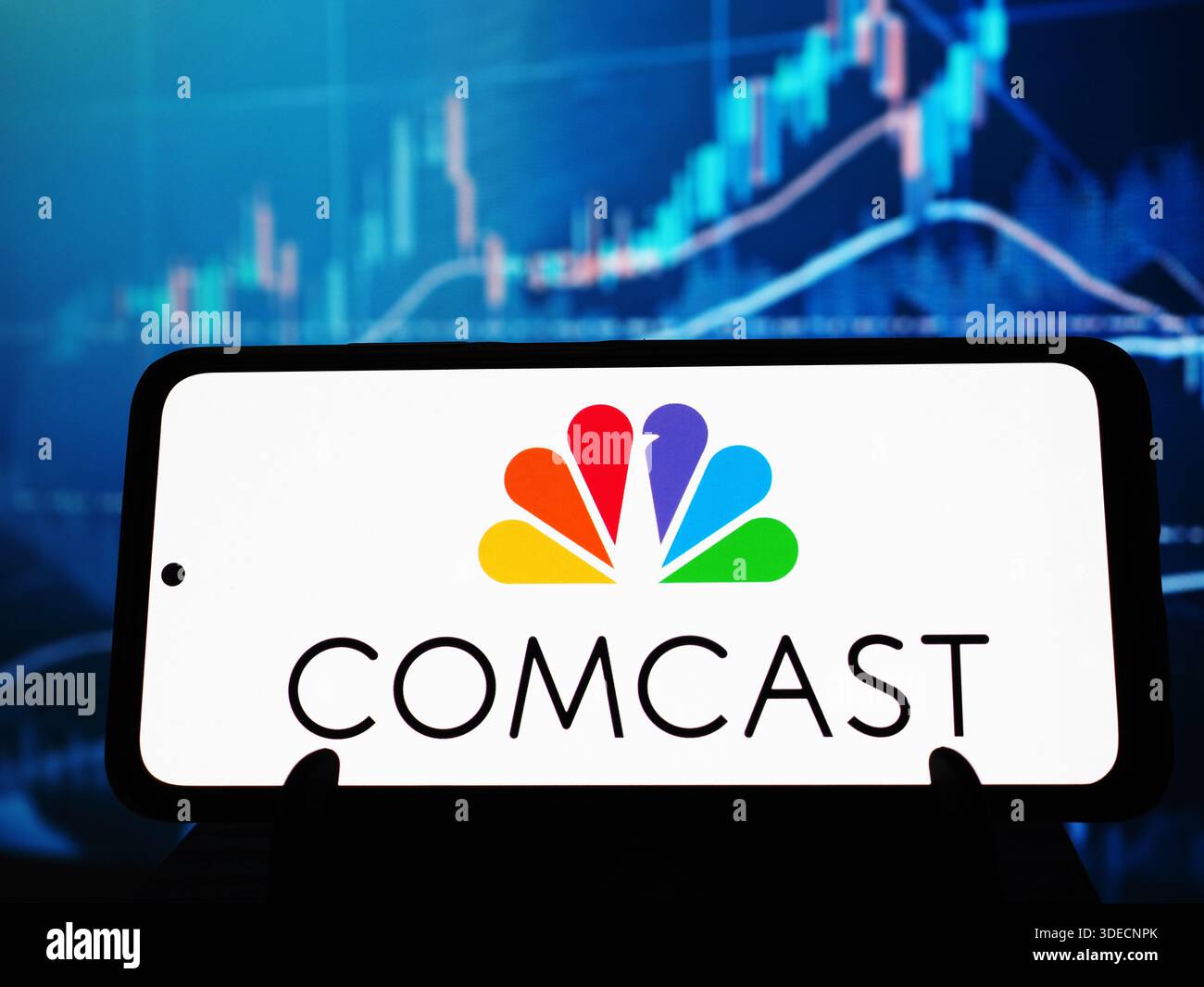 In this photo illustration, Comcast Corporation logo seen displayed on ...