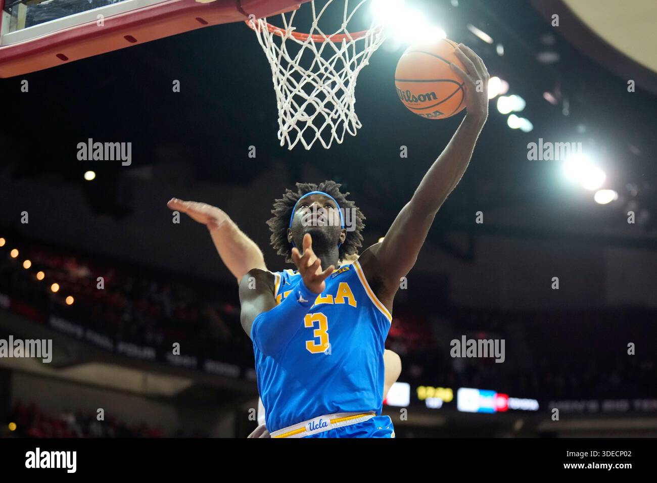 UCLA forward Eric Dailey Jr. scores during the first half of an NCAA ...
