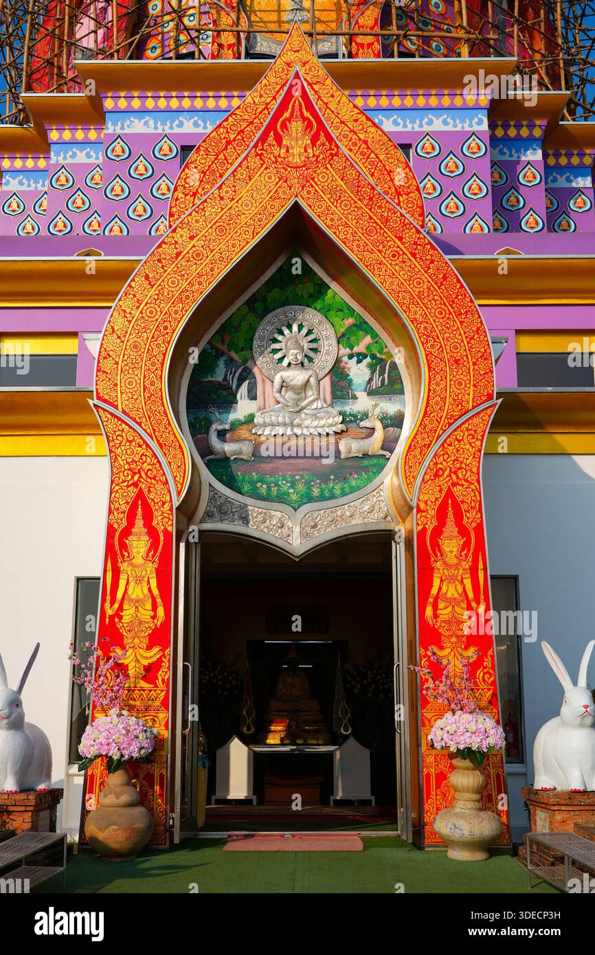 Intricate relief of Buddha’s first sermon over the entrance of the ...