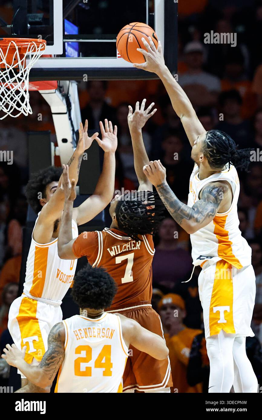 Tennessee Amari Evans, right, blocks the shot of Texas guard Simeon ...