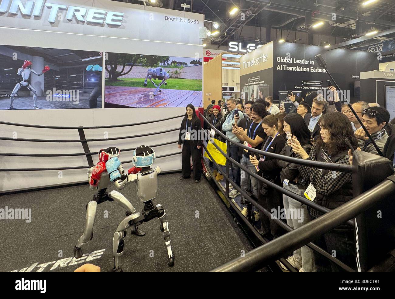 Two humanoid robots produced by the Chinese company Unitree Robotics ...