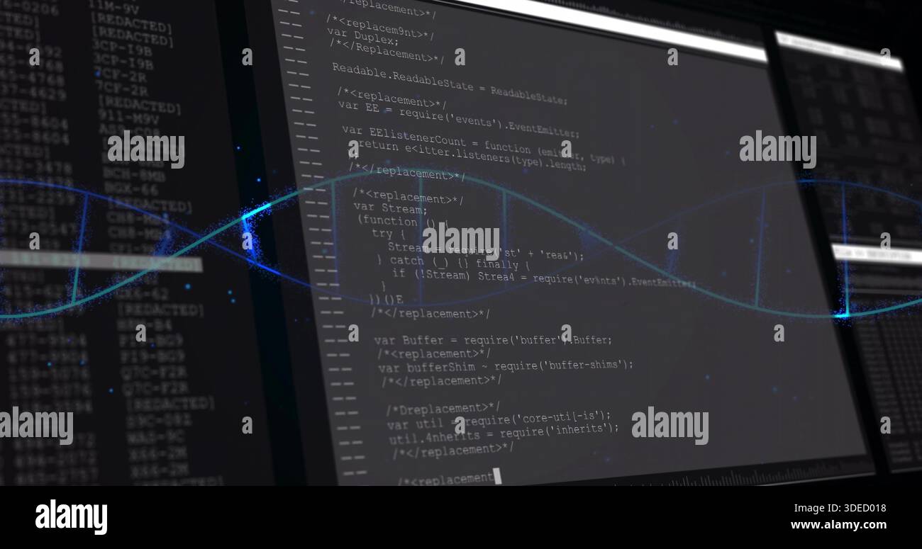 Displaying central monitor showing JavaScript code in dim workstation ...