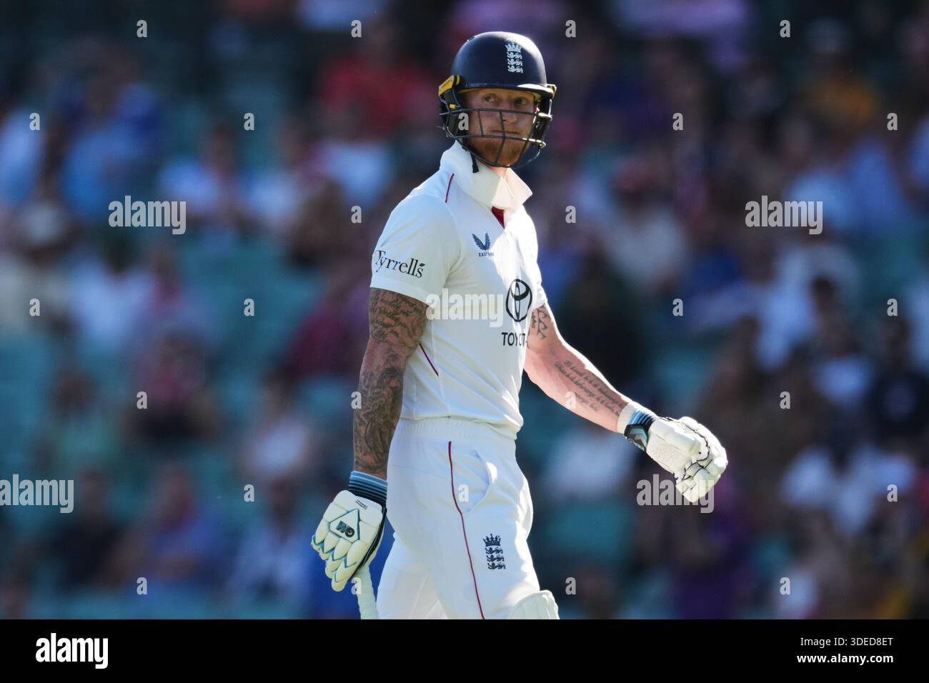 England's Ben Stokes walks from the field after he was dismissed during ...