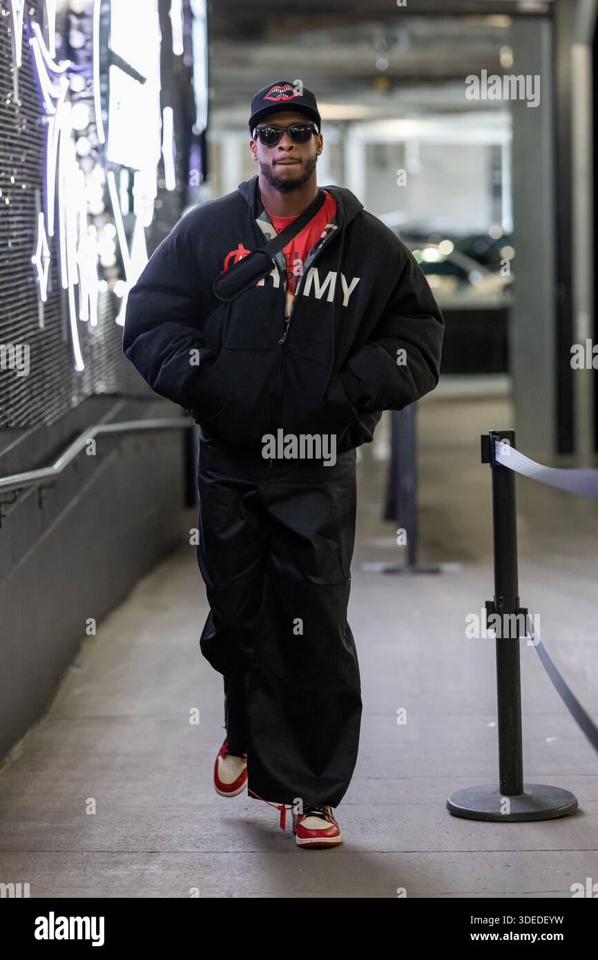 Las Vegas Raiders quarterback Geno Smith arrives at the stadium before ...