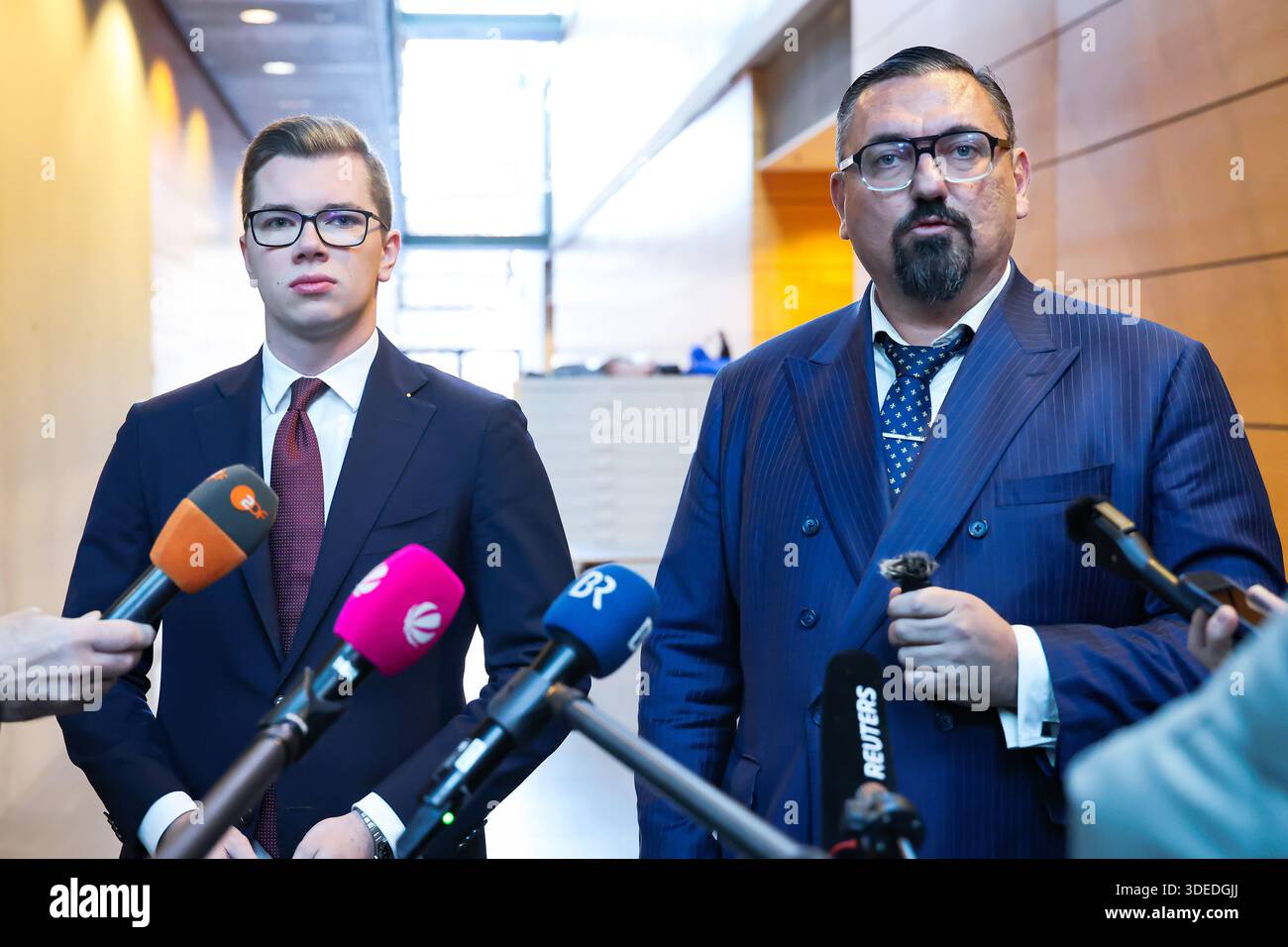 07 January 2026, Bavaria, Würzburg: AfD MP Daniel Halemba (l) gives a ...