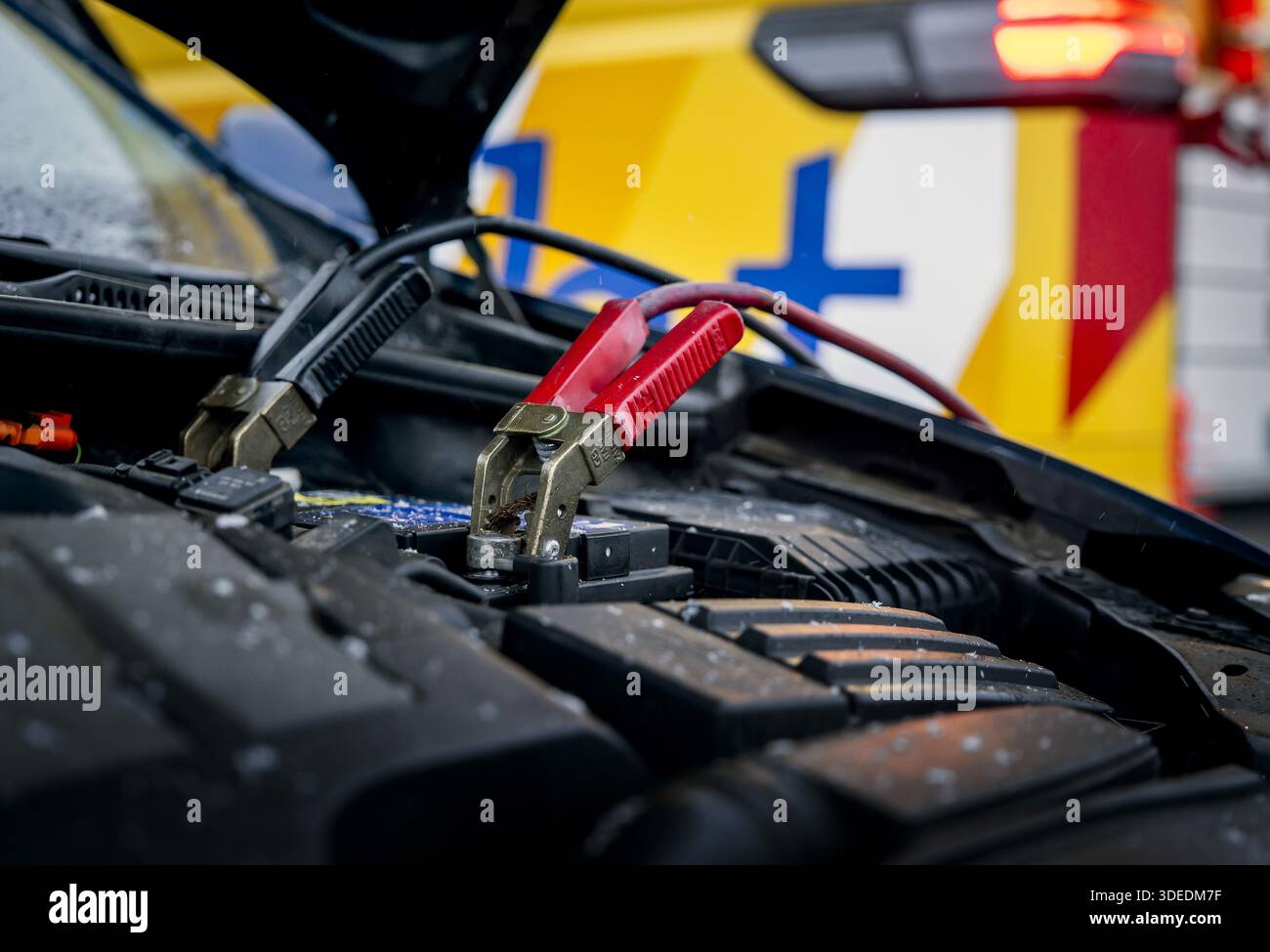 EGMOND AAN ZEE - An ANWB roadside assistance worker attends to a ...