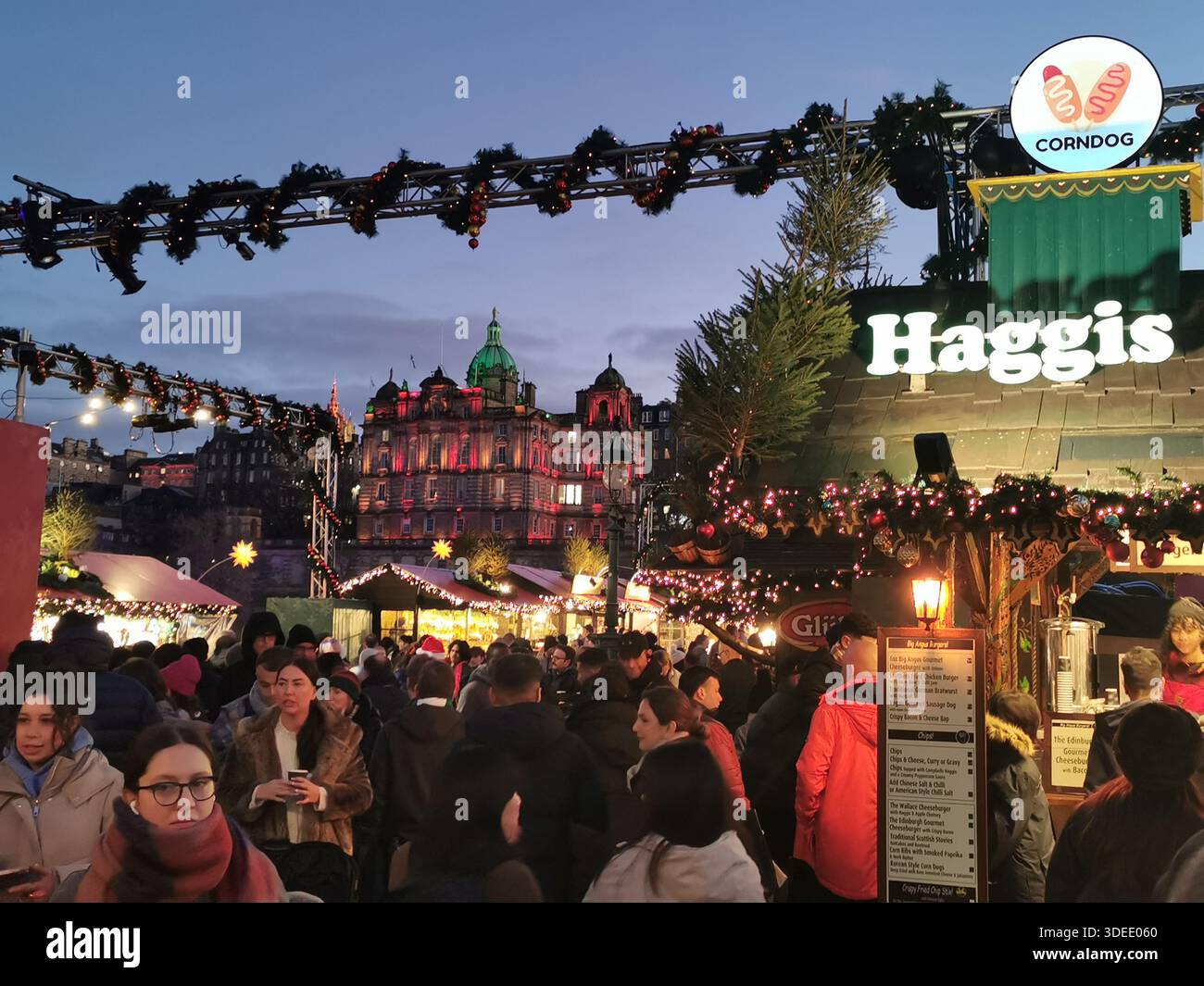 Festive stalls at Edinburgh Christmas Market with lights, local crafts ...
